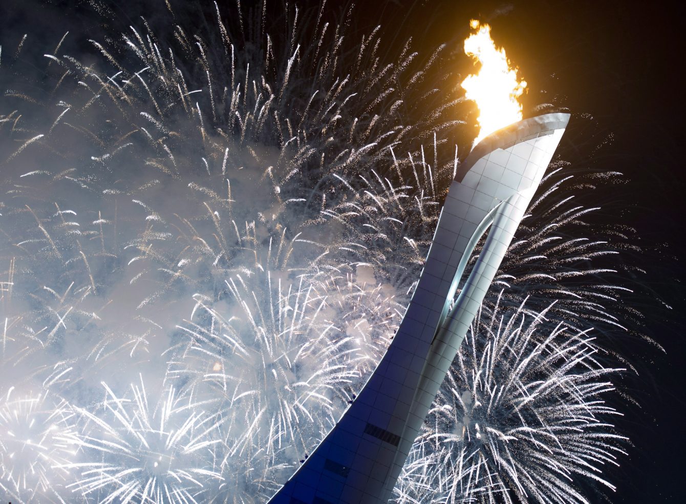 Memorable flame lightings from past Olympic Winter Games - Team Canada